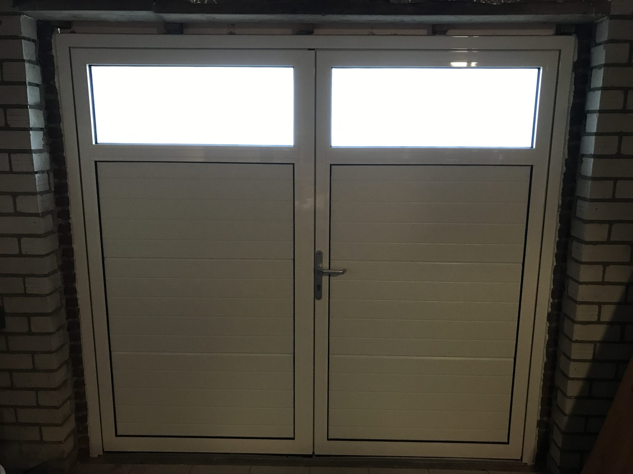 Openslaande garagedeuren in Deurne - Kijkopgaragedeuren